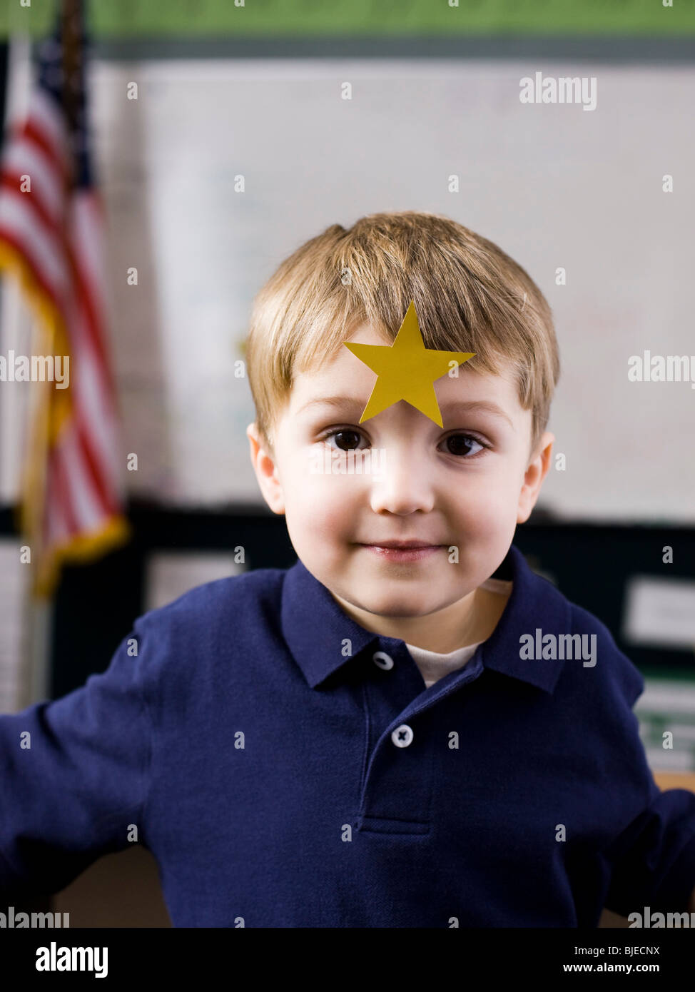 boy with gold star Stock Photo - Alamy