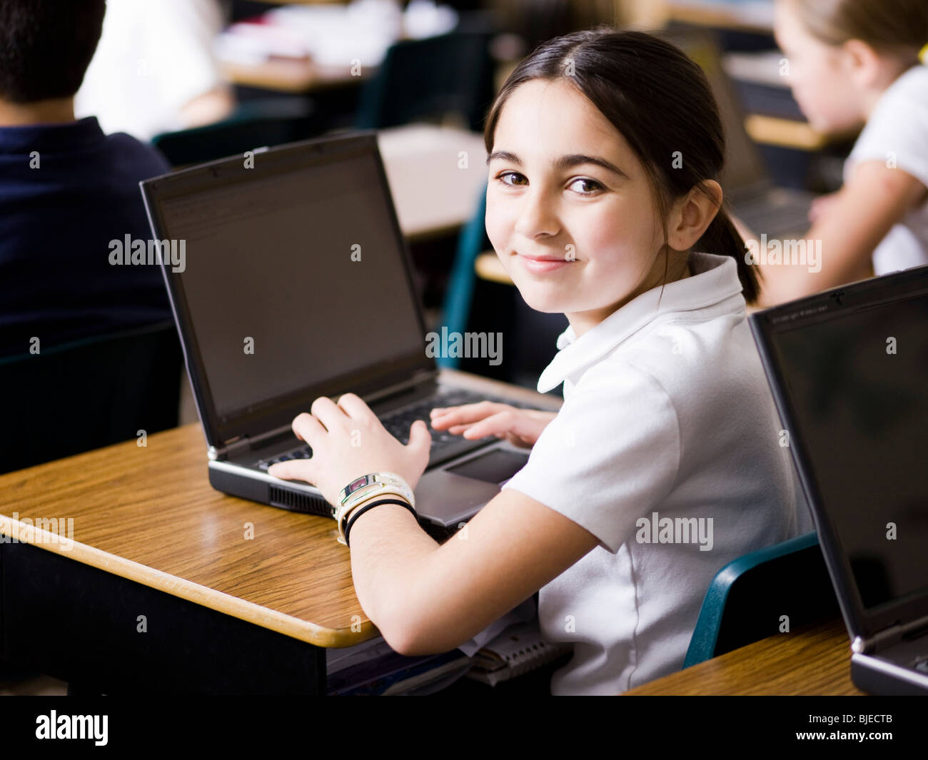 girl with laptop at school Stock Photo - Alamy