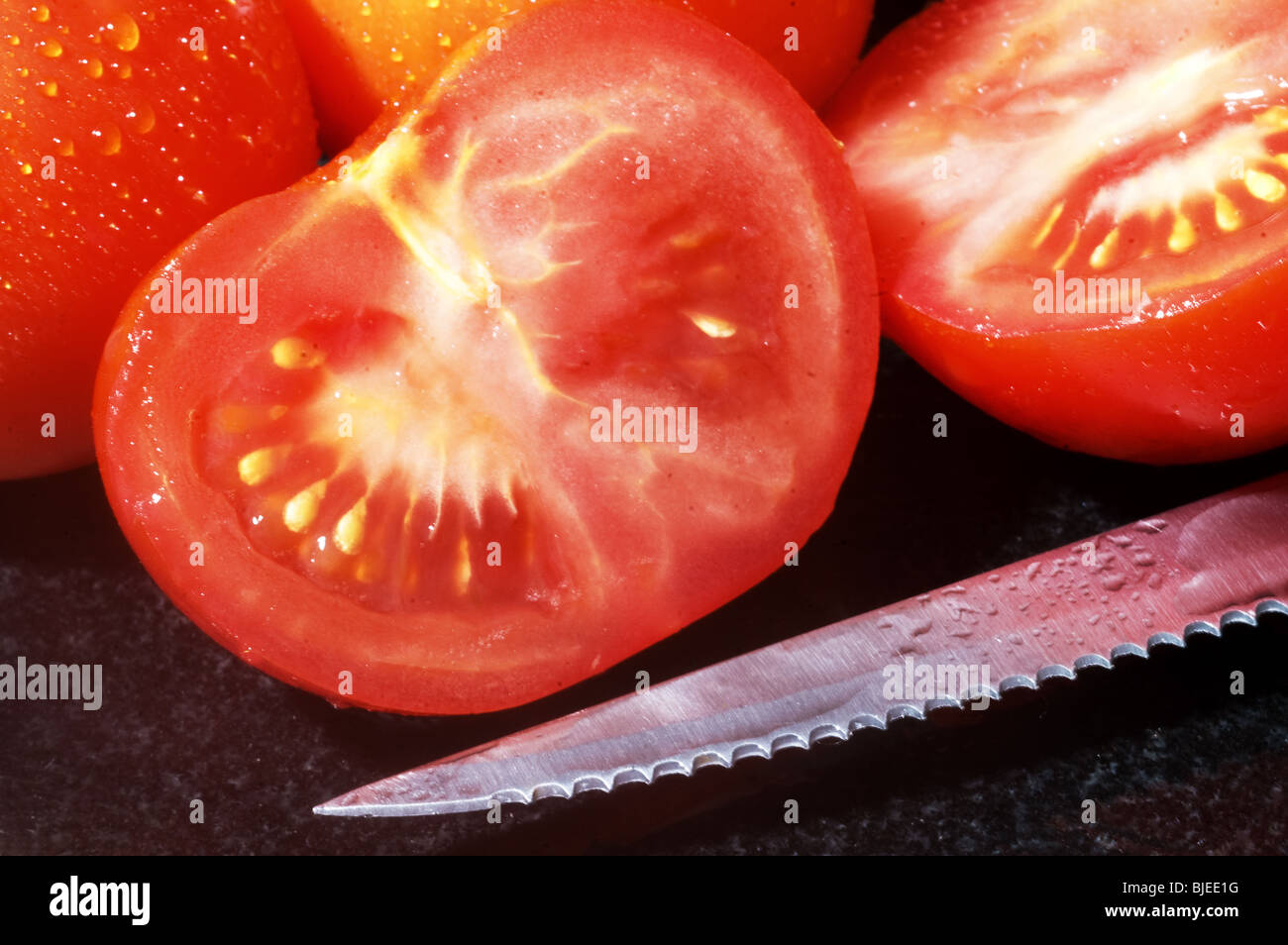 cut tomatoes.JUICIER TOMATOES Stock Photo - Alamy