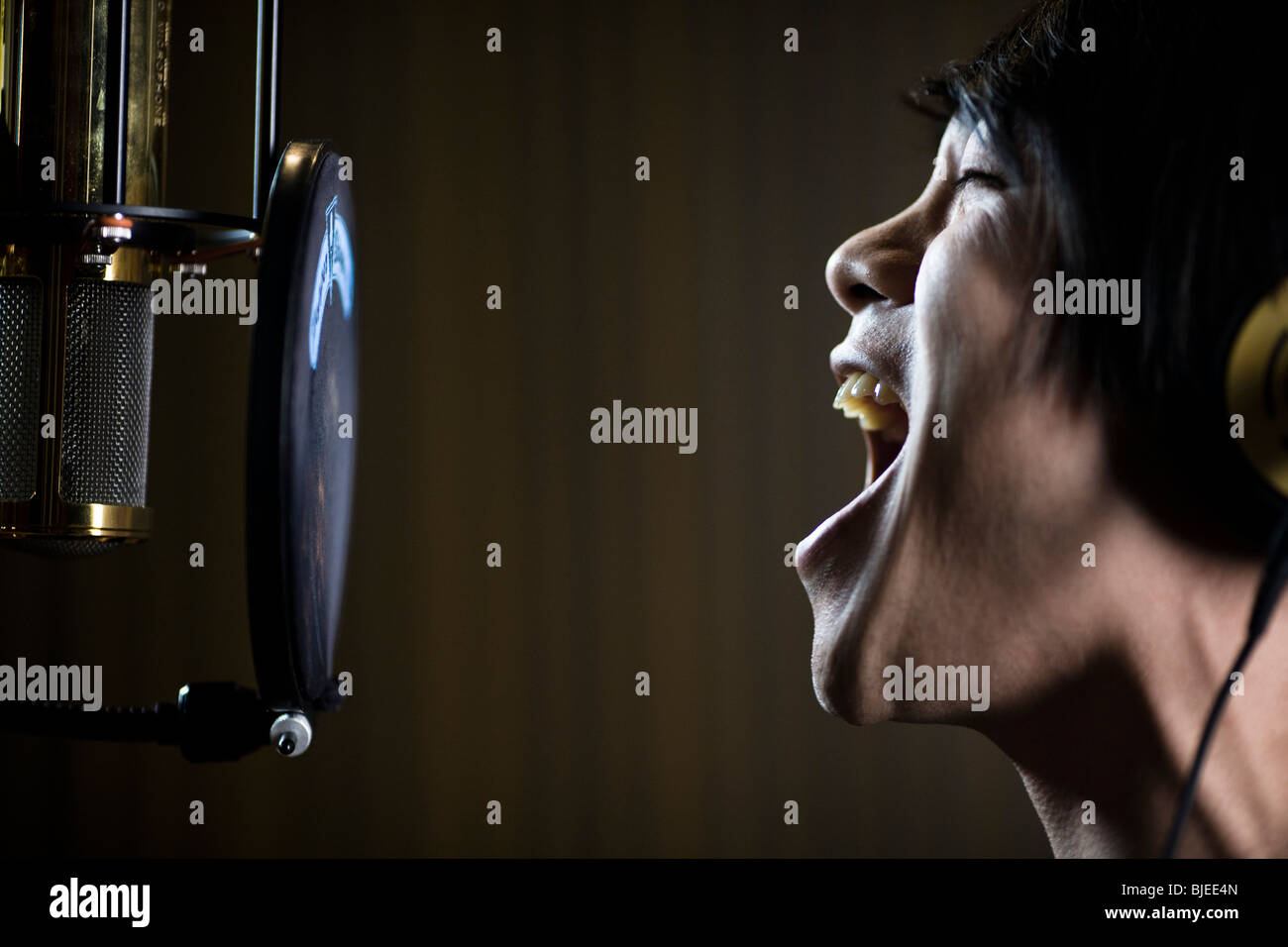 singing in a recording studio Stock Photo - Alamy