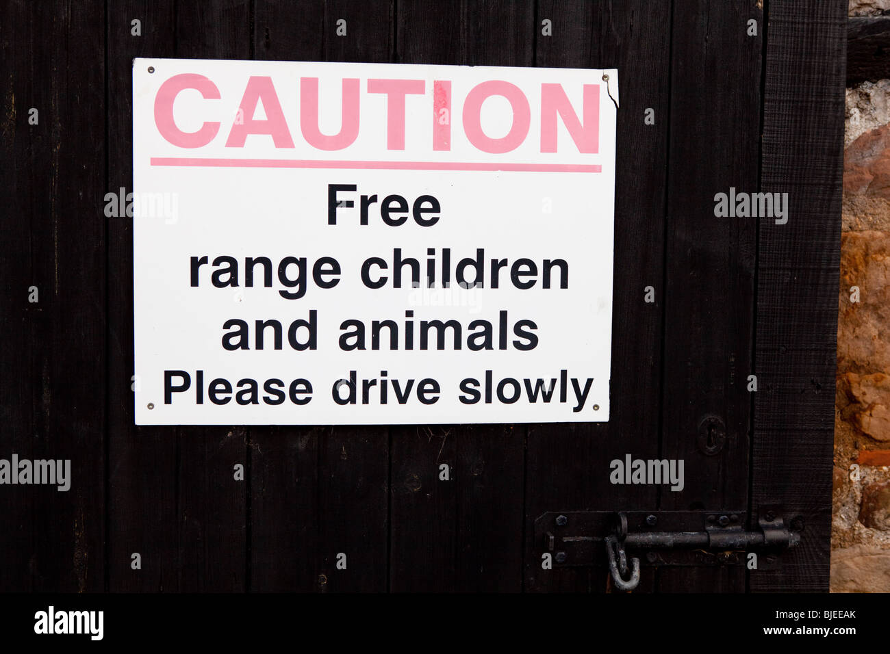 Sign warning free range children hi-res stock photography and images ...