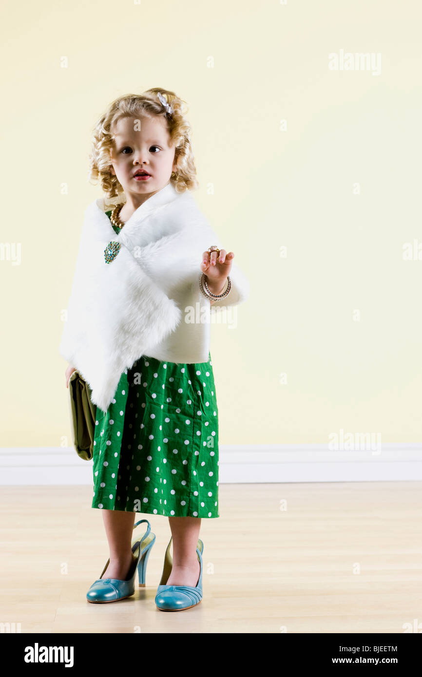 little girl playing dress up Stock Photo - Alamy