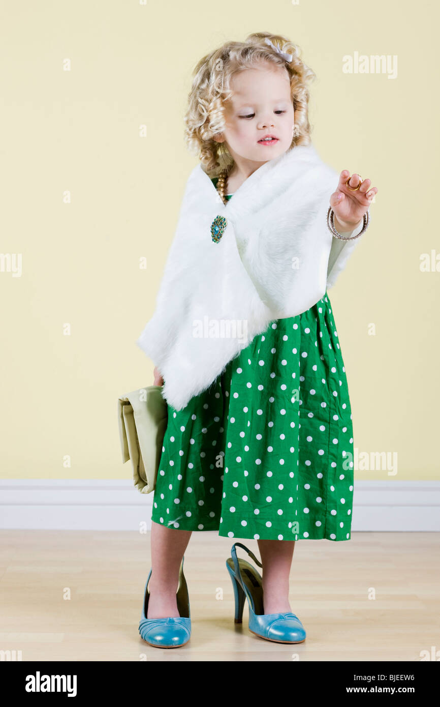 little girl playing dress up Stock Photo - Alamy