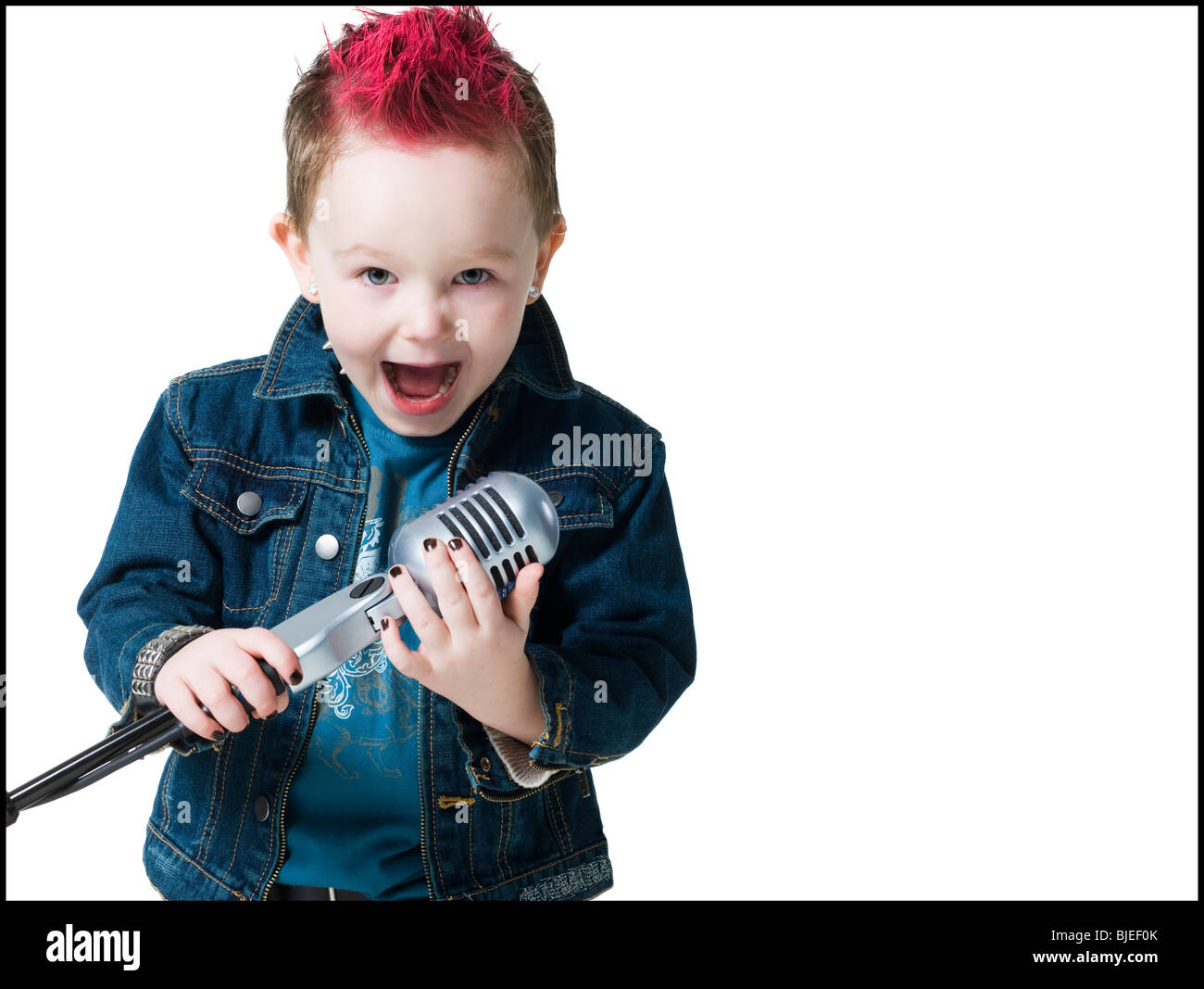 little boy singing into a microphone Stock Photo - Alamy