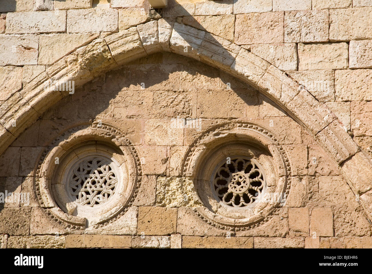 Tarragona cathedral rose window masonry Stock Photo - Alamy