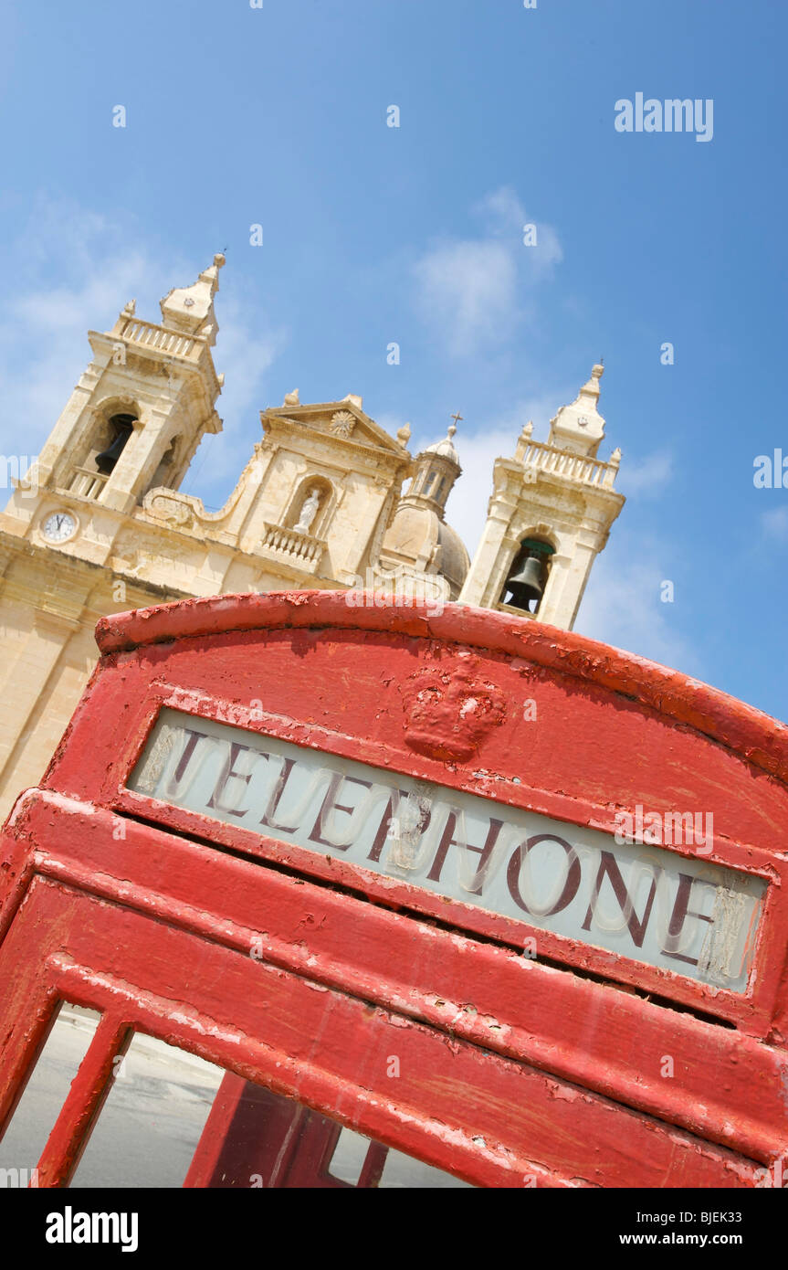 Telephone cell with cathedral in the back, ZEbbug, Malta Stock Photo ...