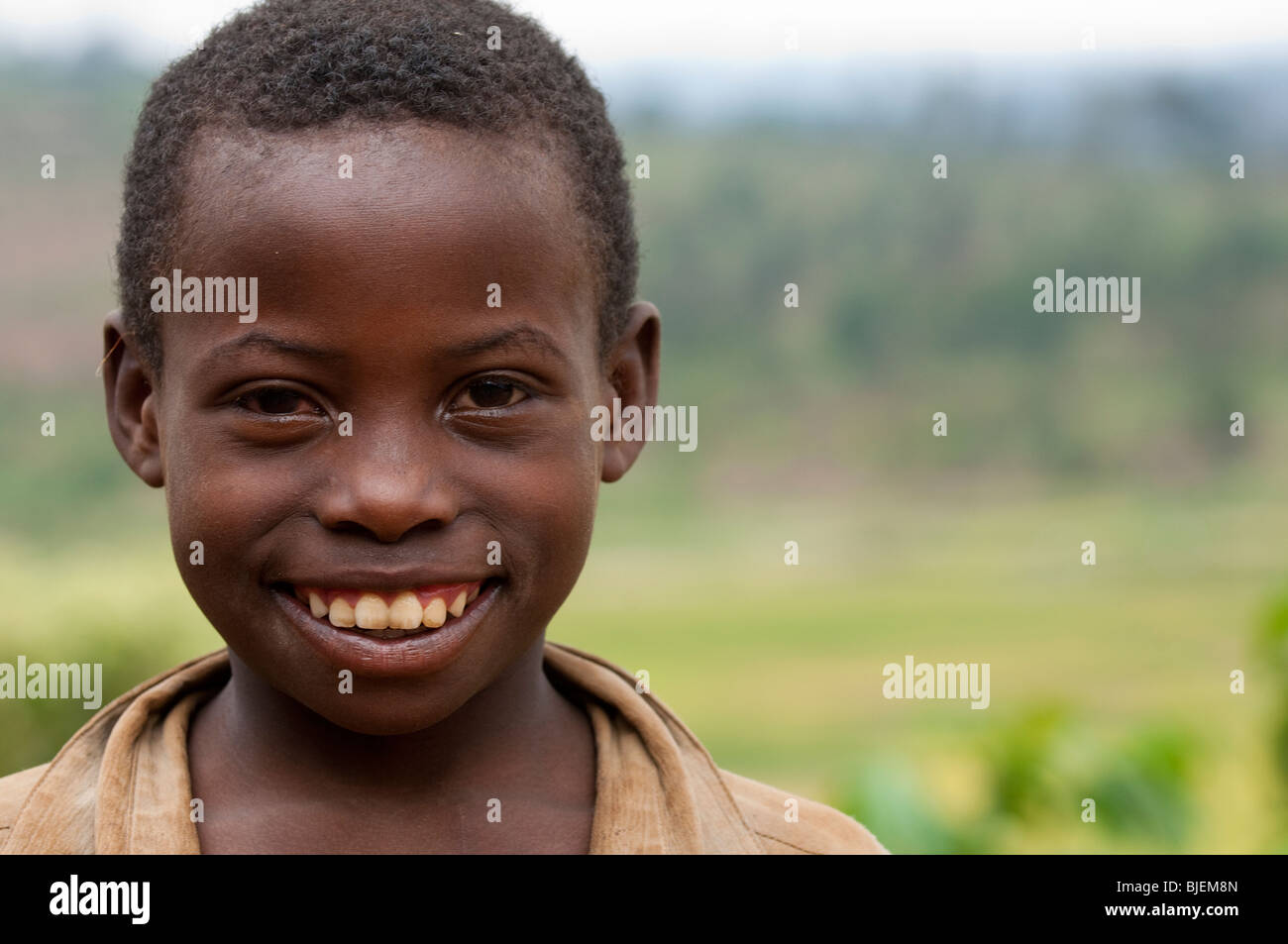 Smiling boy in countryside, Rwanda Stock Photo - Alamy
