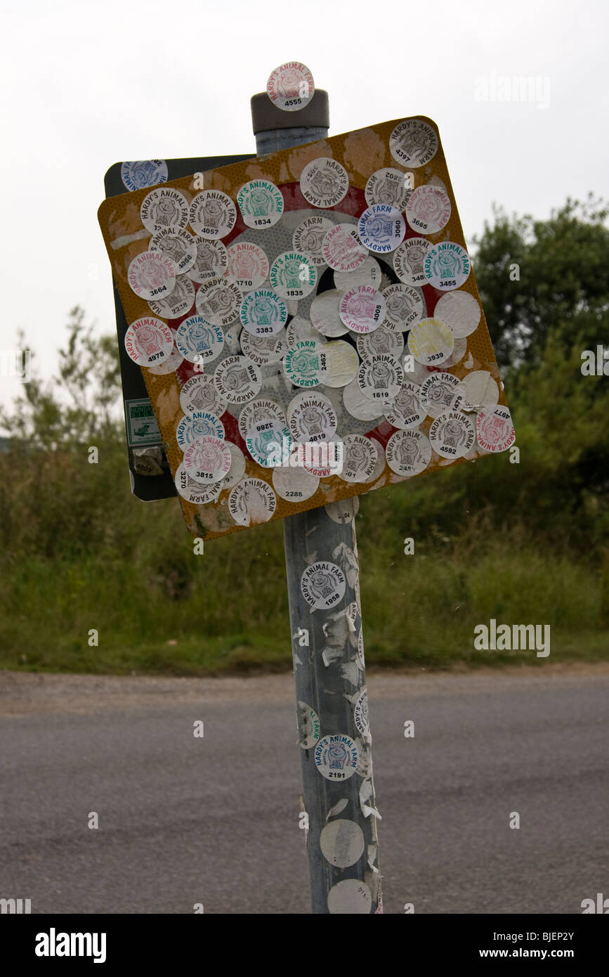 Stickers on road sign hi-res stock photography and images - Alamy