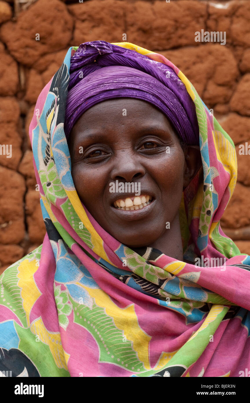 Rwandan Muslim woman with bight coloured head scarf Stock Photo - Alamy