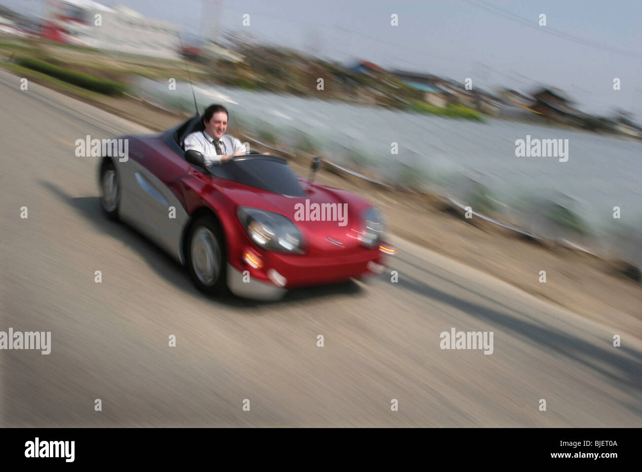 driving an electric car , the 'Aero EV Elexceed RS' made by Zero/Sports ...