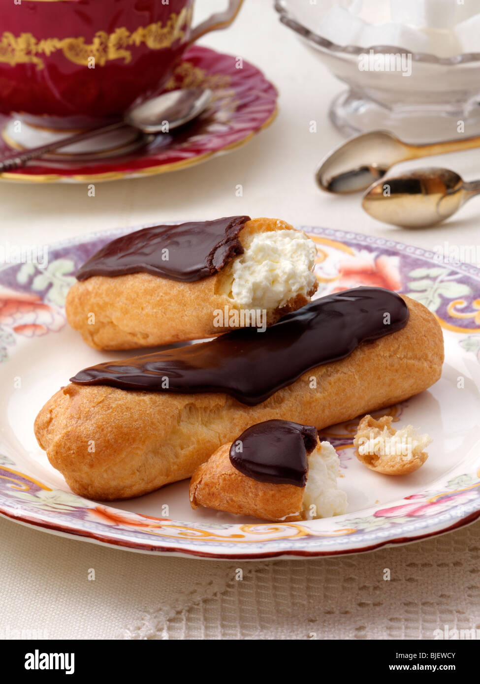 Plate chocolate eclairs hi-res stock photography and images - Alamy