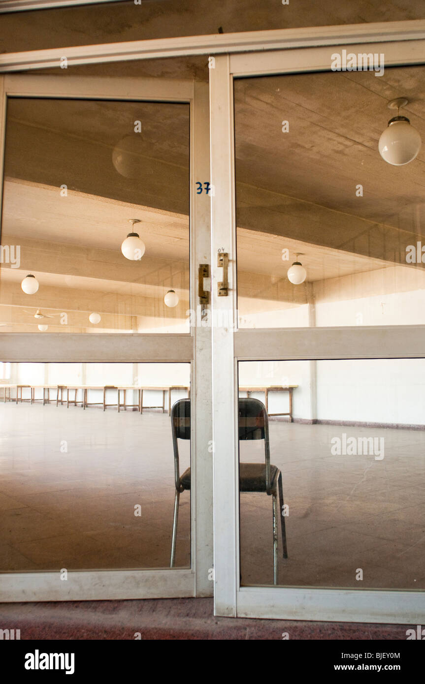 Door with chair behind Stock Photo - Alamy
