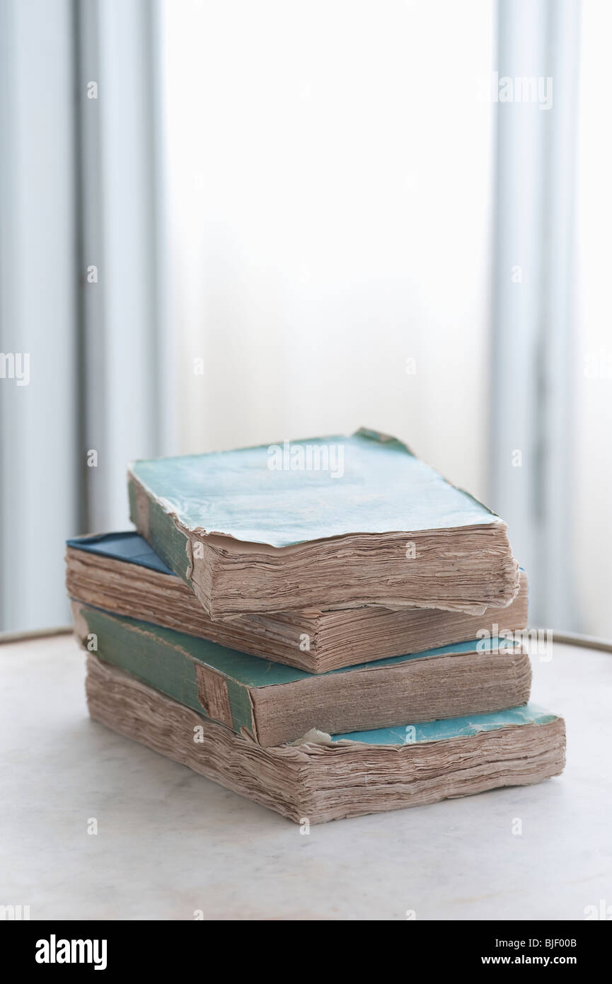 Stack of four old books Stock Photo - Alamy