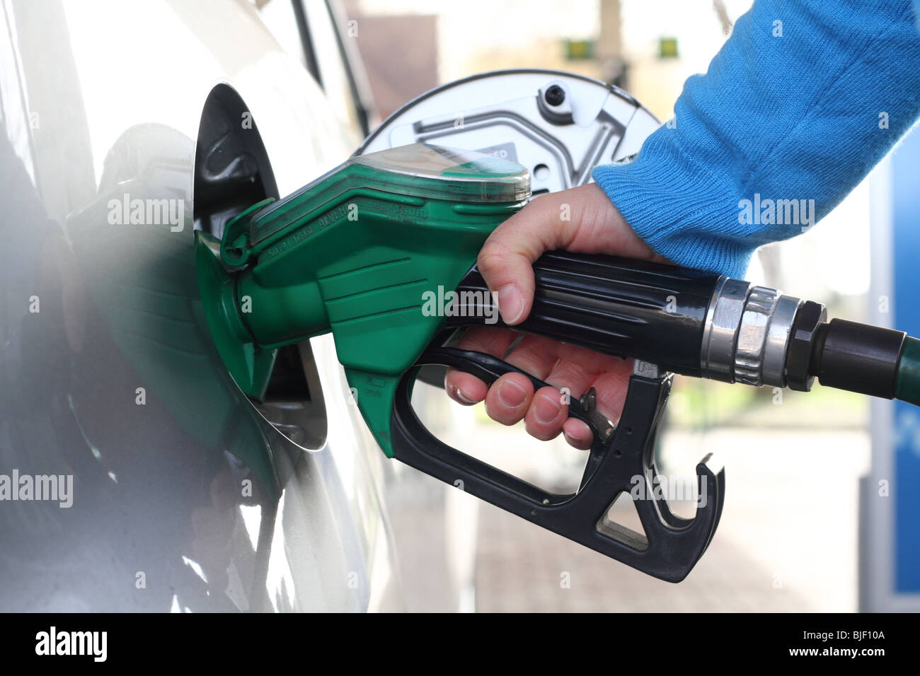 Motorist fills up hi-res stock photography and images - Alamy