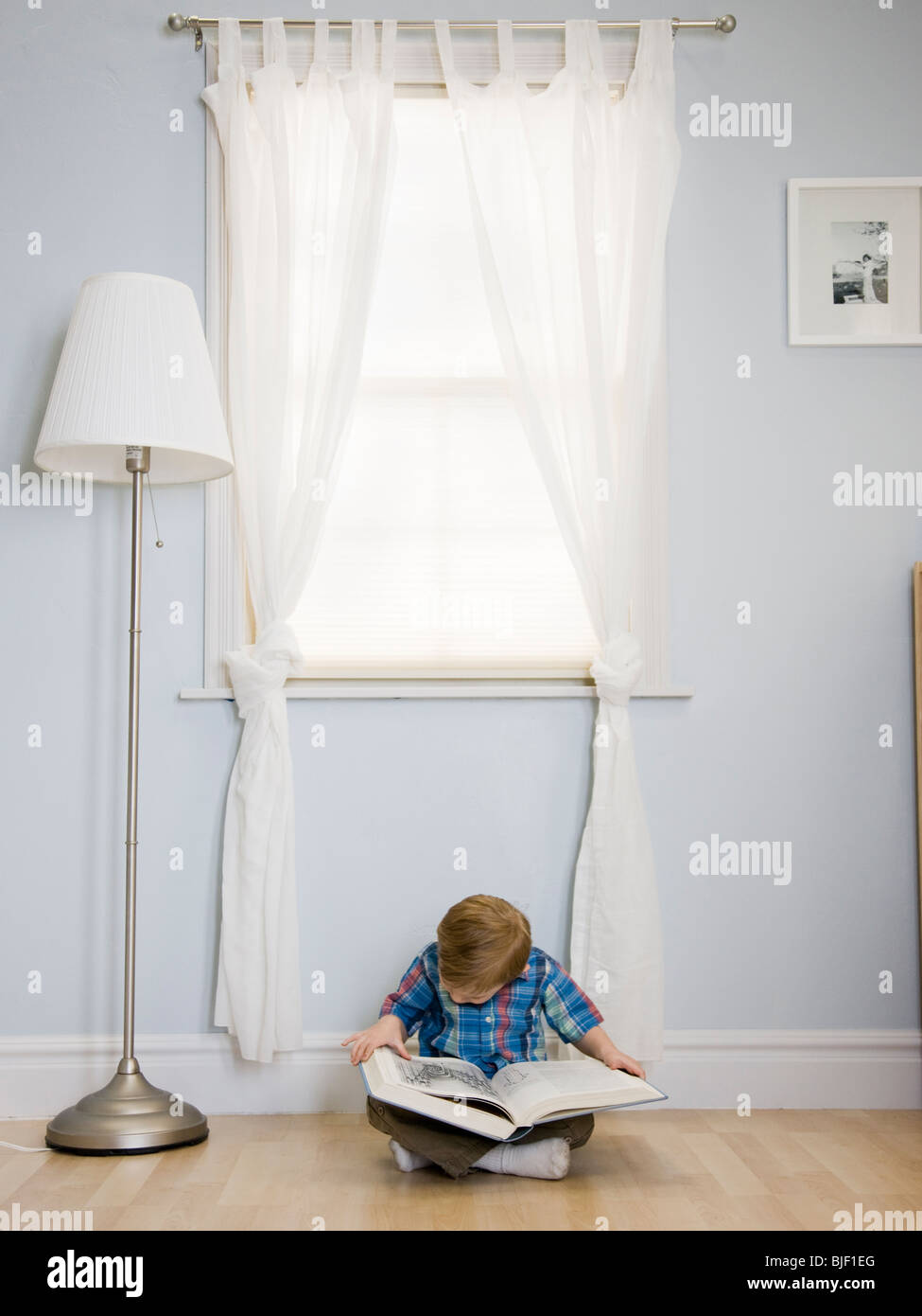 little boy reading Stock Photo - Alamy