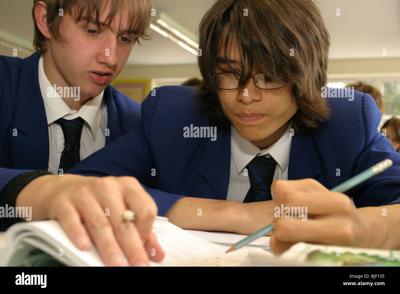 Students working together in maths lesson in secondary school Stock ...