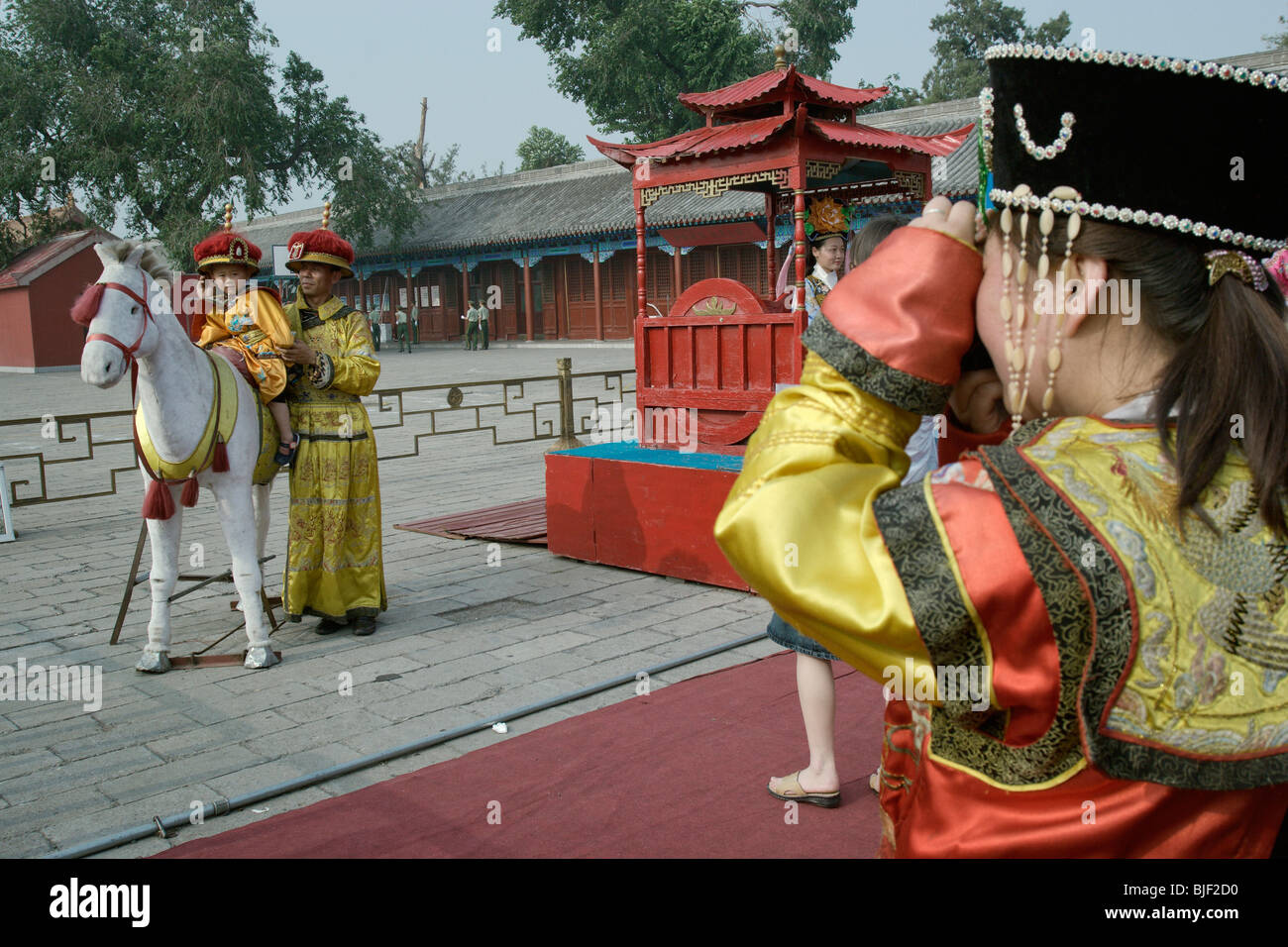 Family taking costume photos in Forbidden City, Beijing, China Stock ...