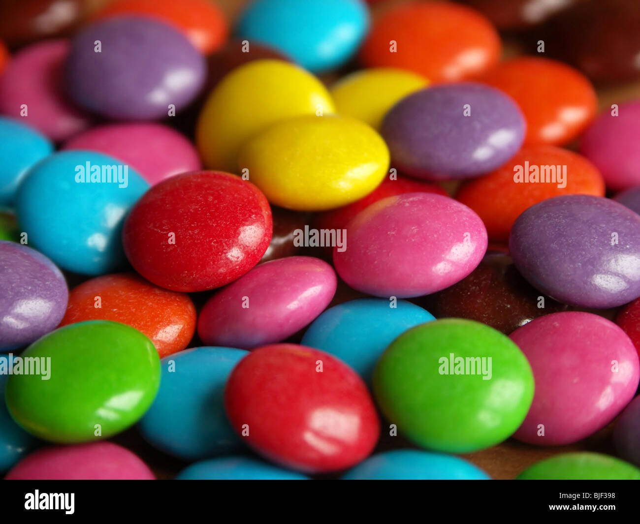 Many colors of sweet candys Stock Photo - Alamy