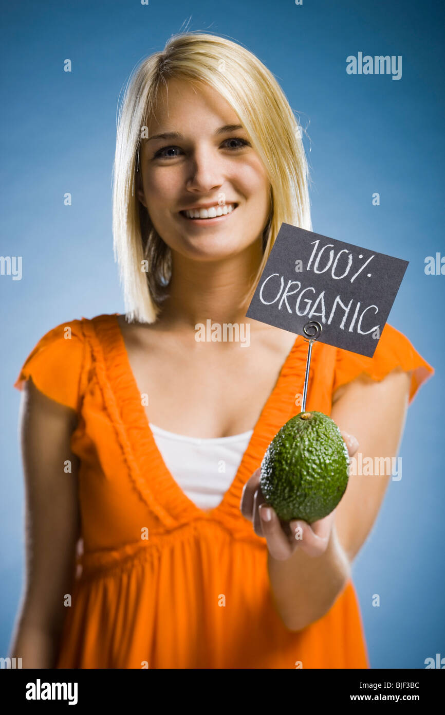 woman holding organic produce Stock Photo - Alamy