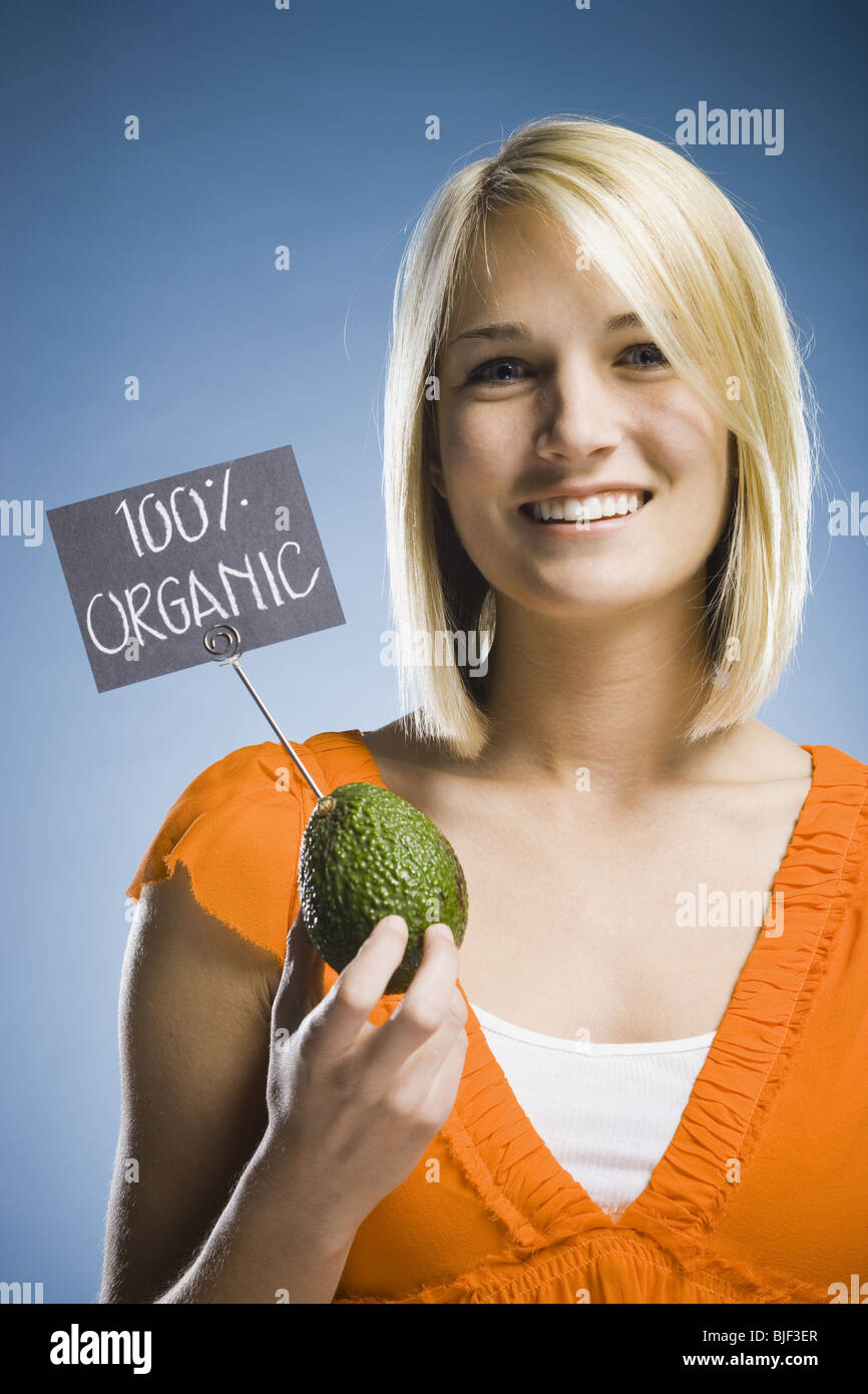 woman holding organic produce Stock Photo - Alamy