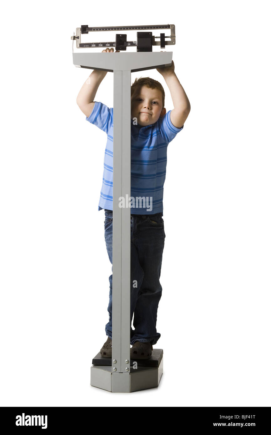 little boy on a scale Stock Photo - Alamy