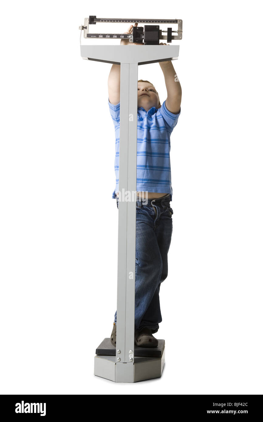 little boy on a scale Stock Photo - Alamy