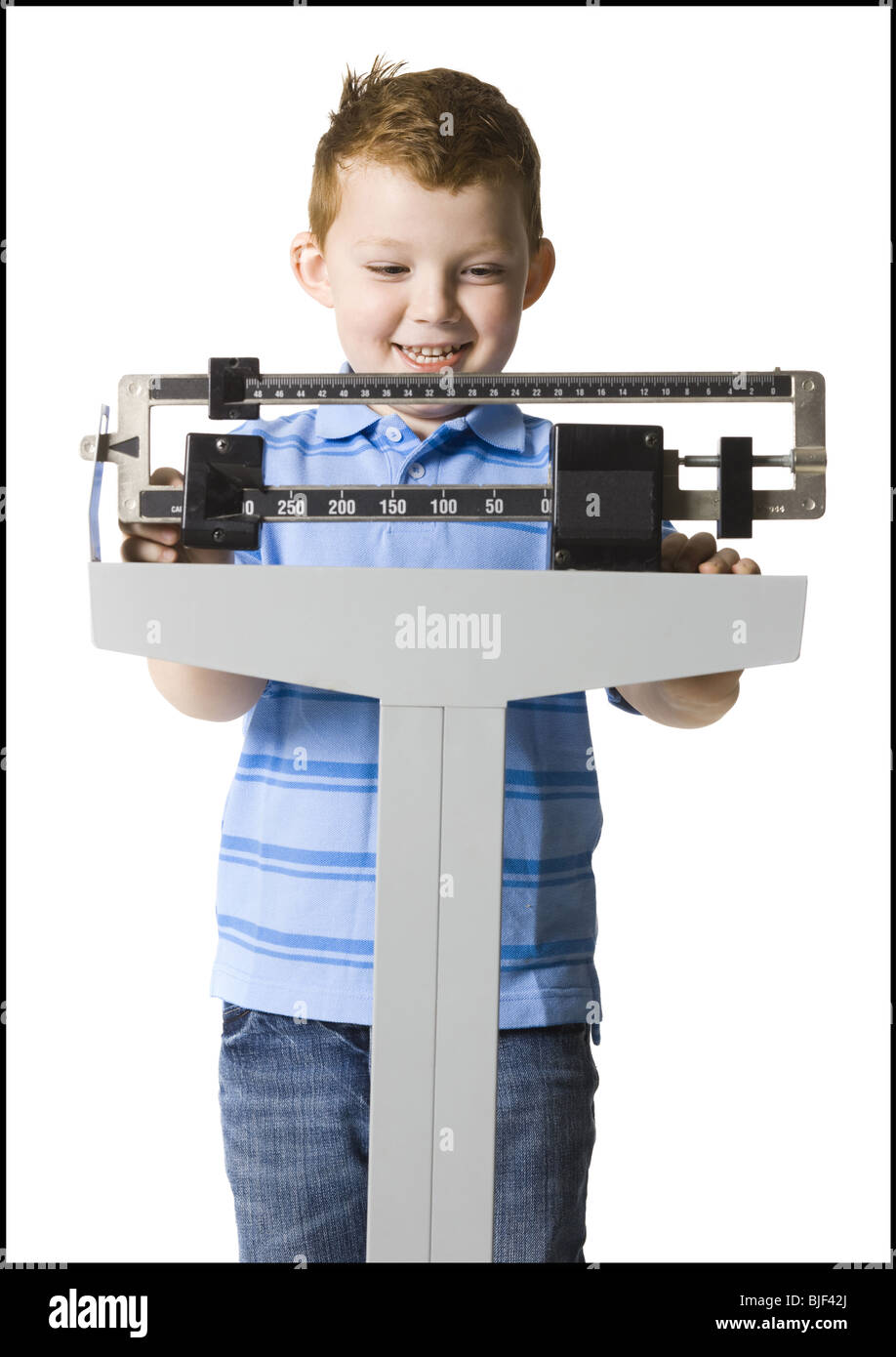 little boy on a scale Stock Photo - Alamy