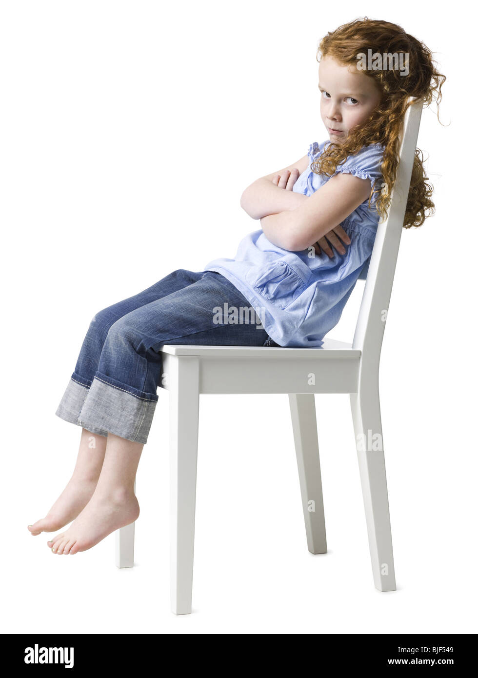 Girl in a chair Cut Out Stock Images & Pictures - Alamy
