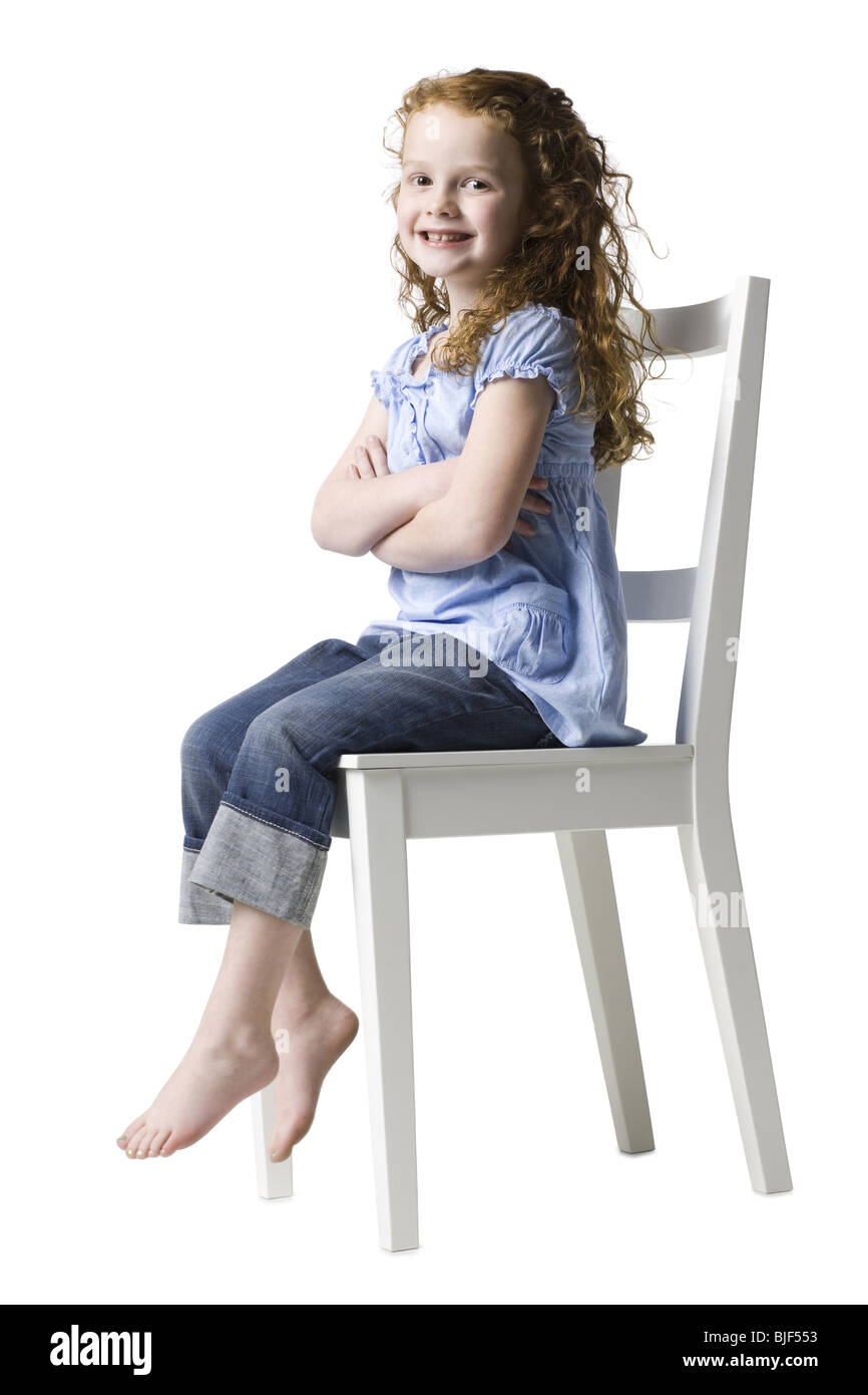 Sitting with arms folded Cut Out Stock Images & Pictures - Alamy