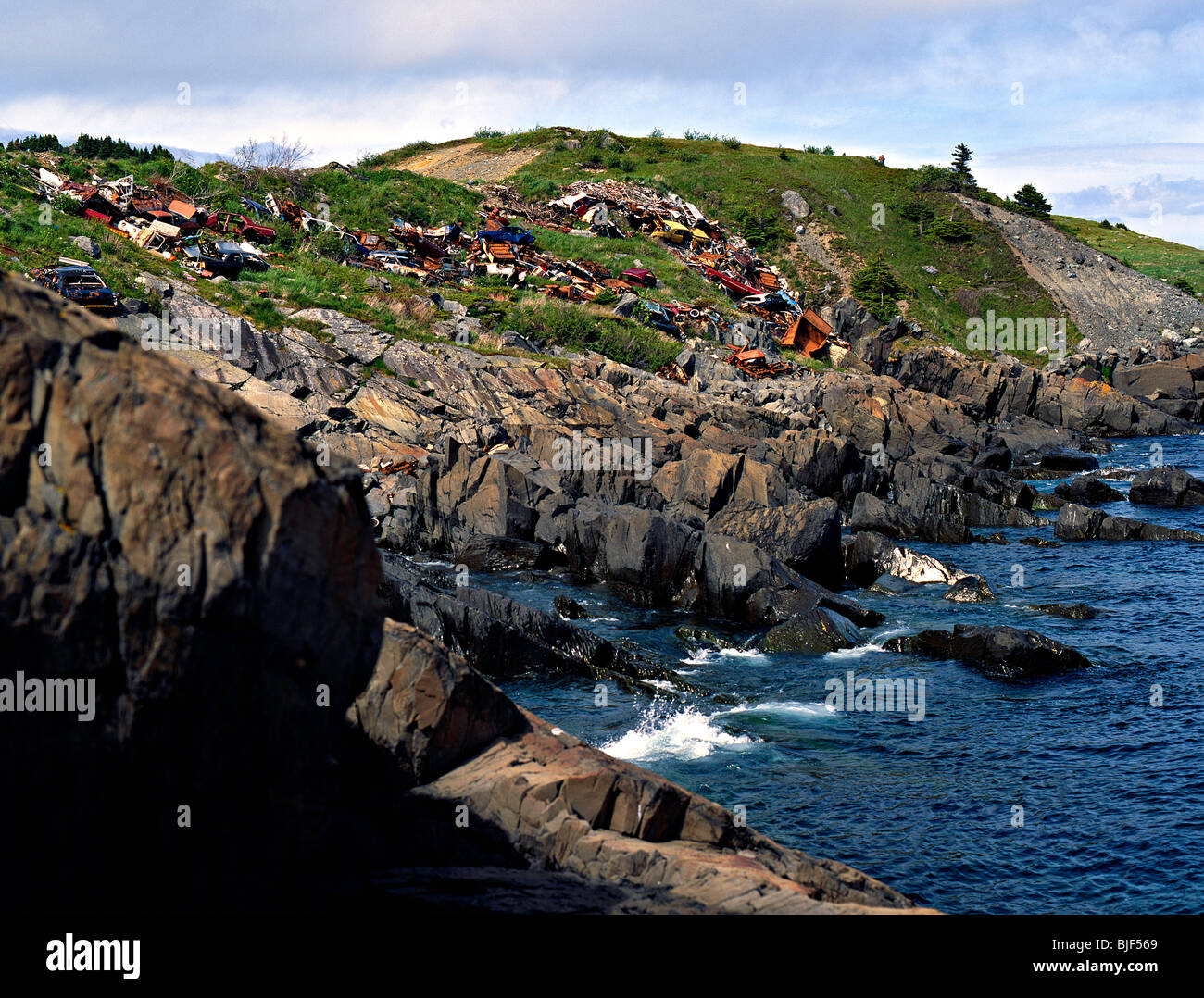 Shoreline pollution with scrap metal and garbage in Newfoundland;Canada ...