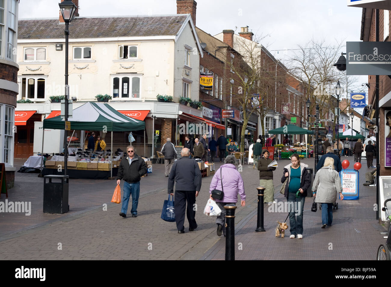 Shoppers in the High Street, Stone, Staffordshire Stock Photo - Alamy