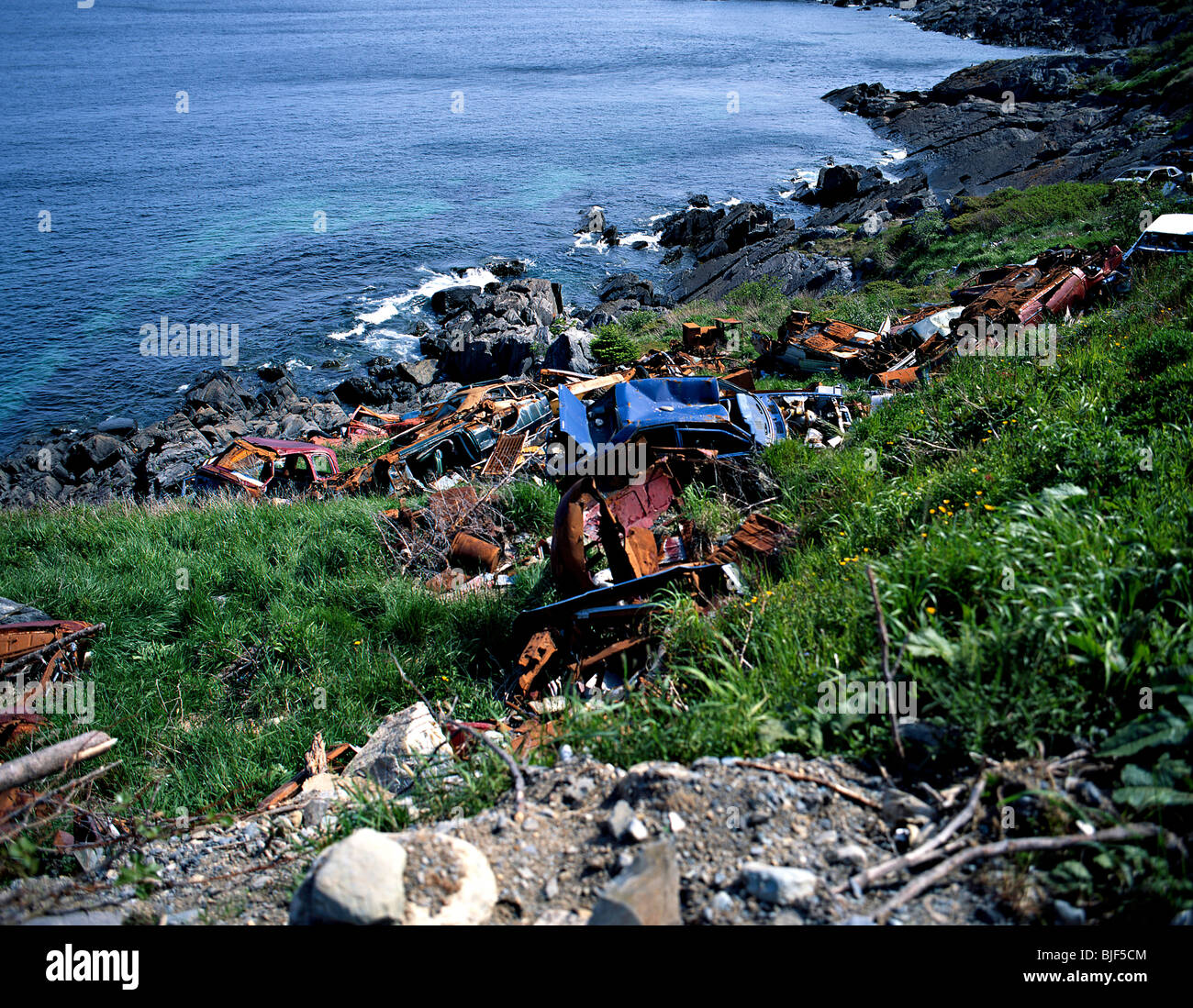Garbage,scrap mental and car regs are polluting the coast line on the ...