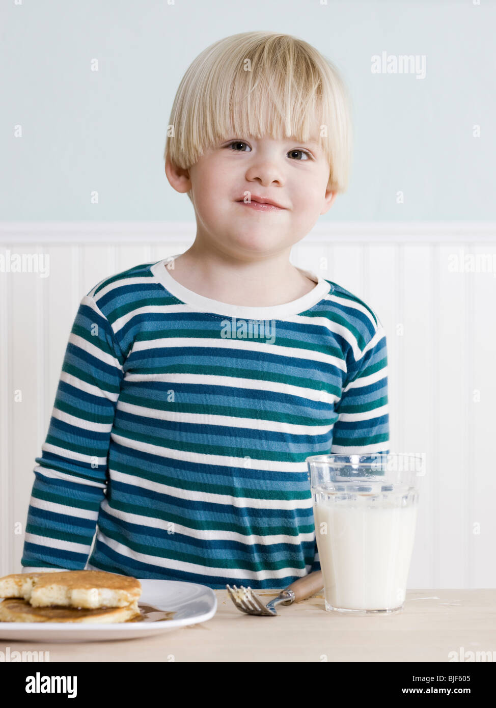 little boy eating breakfast Stock Photo - Alamy