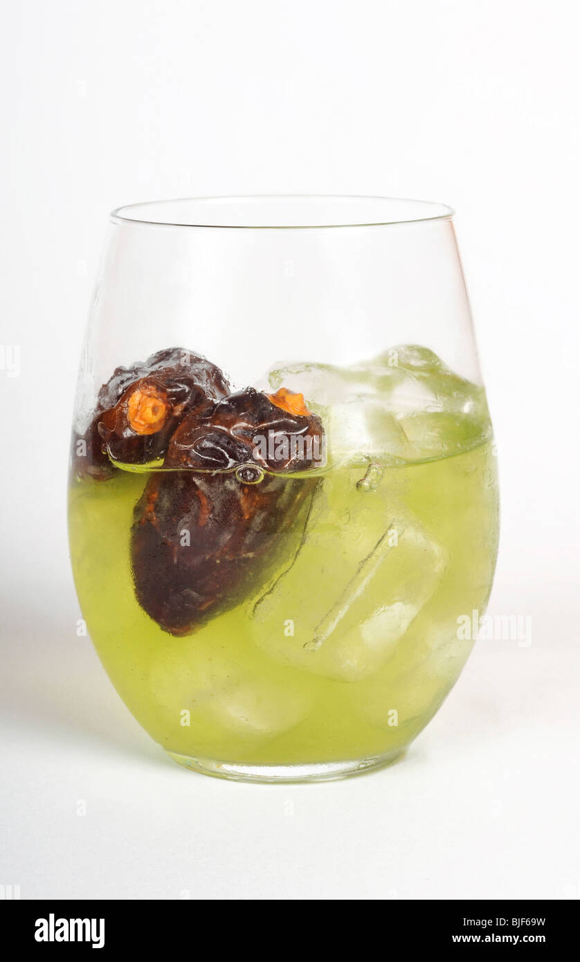 Dates Cocktail on white background Stock Photo - Alamy