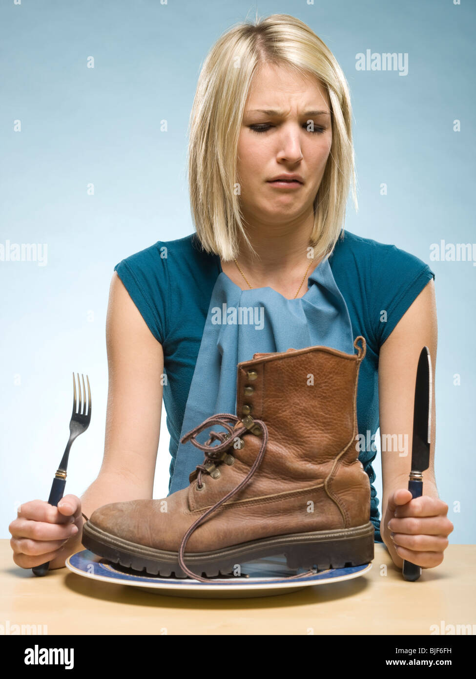 Disgusted woman eating hi-res stock photography and images - Alamy