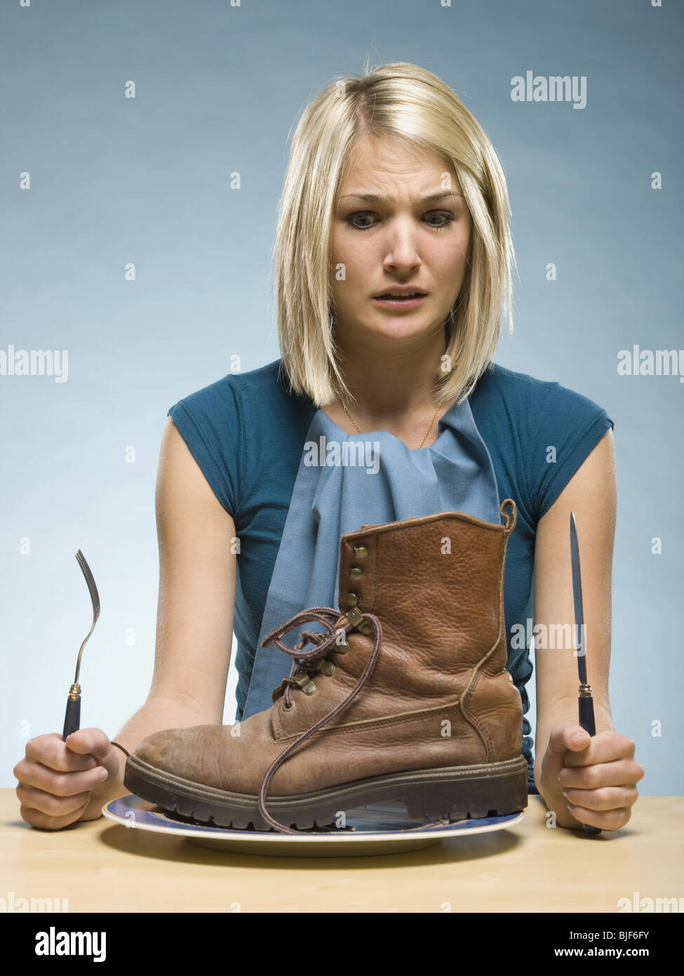 woman eating a boot Stock Photo - Alamy