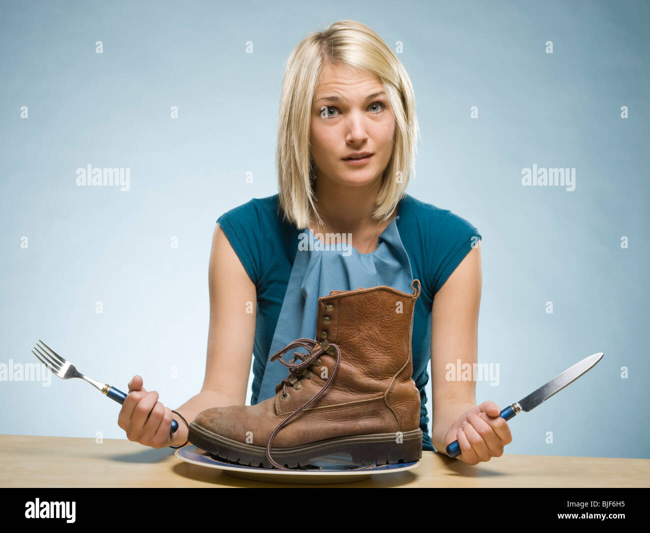 woman eating a boot Stock Photo - Alamy