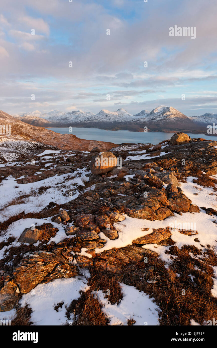 Erratic boulders on Bealach na Gaoithe near Torridon. View towards ...