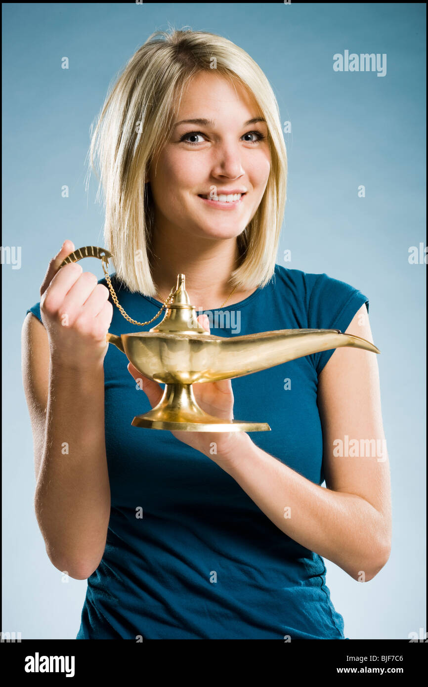 Rubbing the lamp hi-res stock photography and images - Alamy