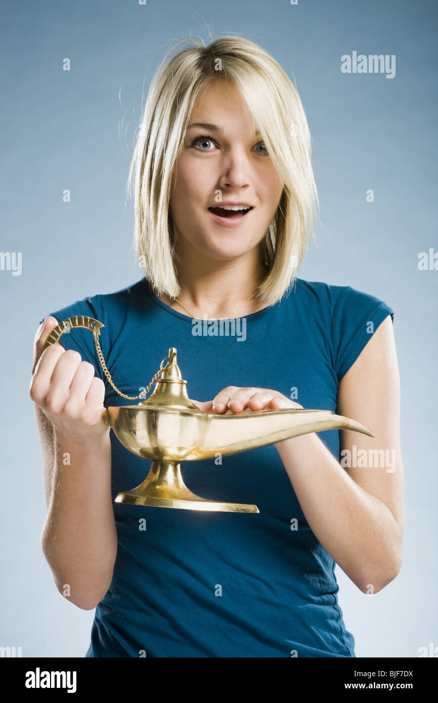Rubbing the lamp hi-res stock photography and images - Alamy