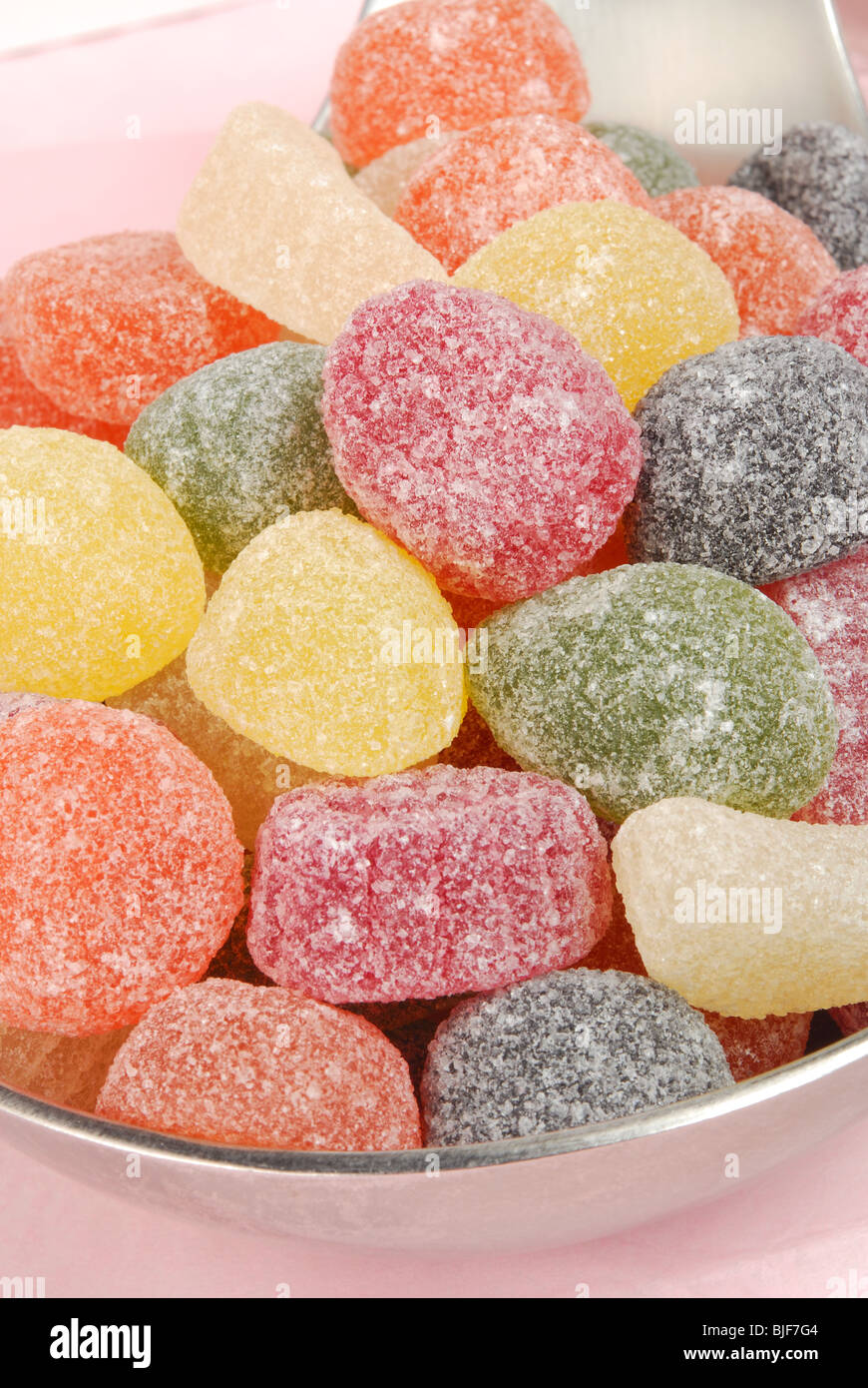Assorted fruit flavoured pastilles in metal hi-res stock photography ...