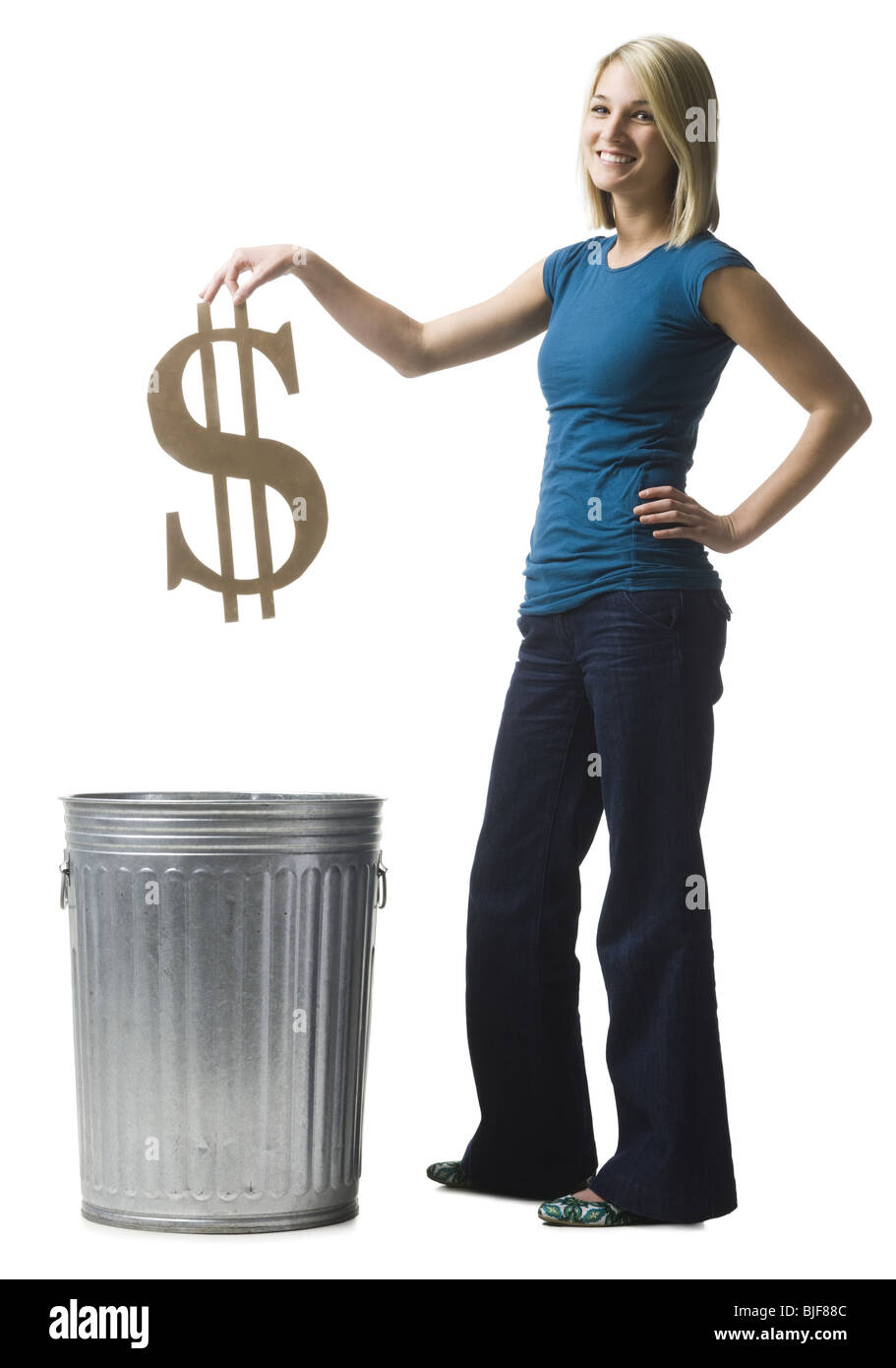 Young woman in trash can Cut Out Stock Images & Pictures - Alamy