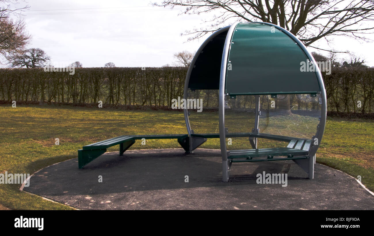 Modern bench in children playground Stock Photo - Alamy