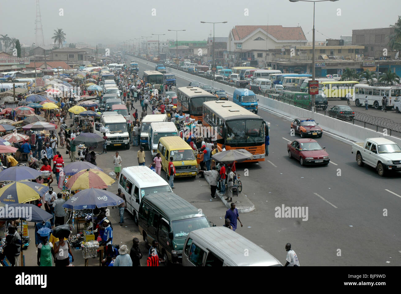 A bustling market, bus and taxi rank on the outskirts of Ghana's ...