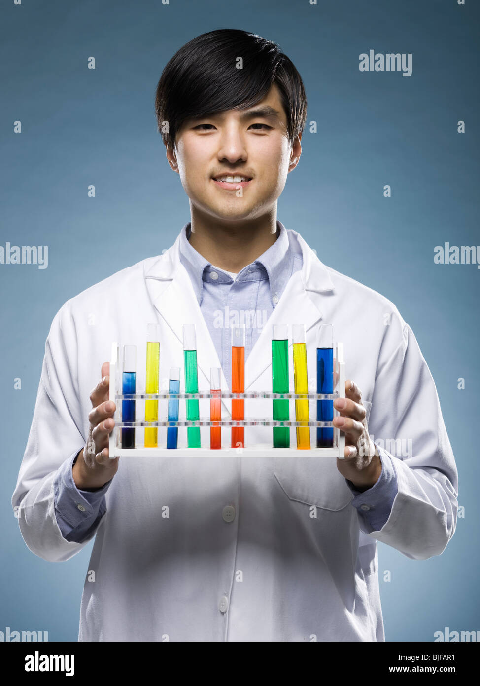 scientist holding test tubes Stock Photo - Alamy