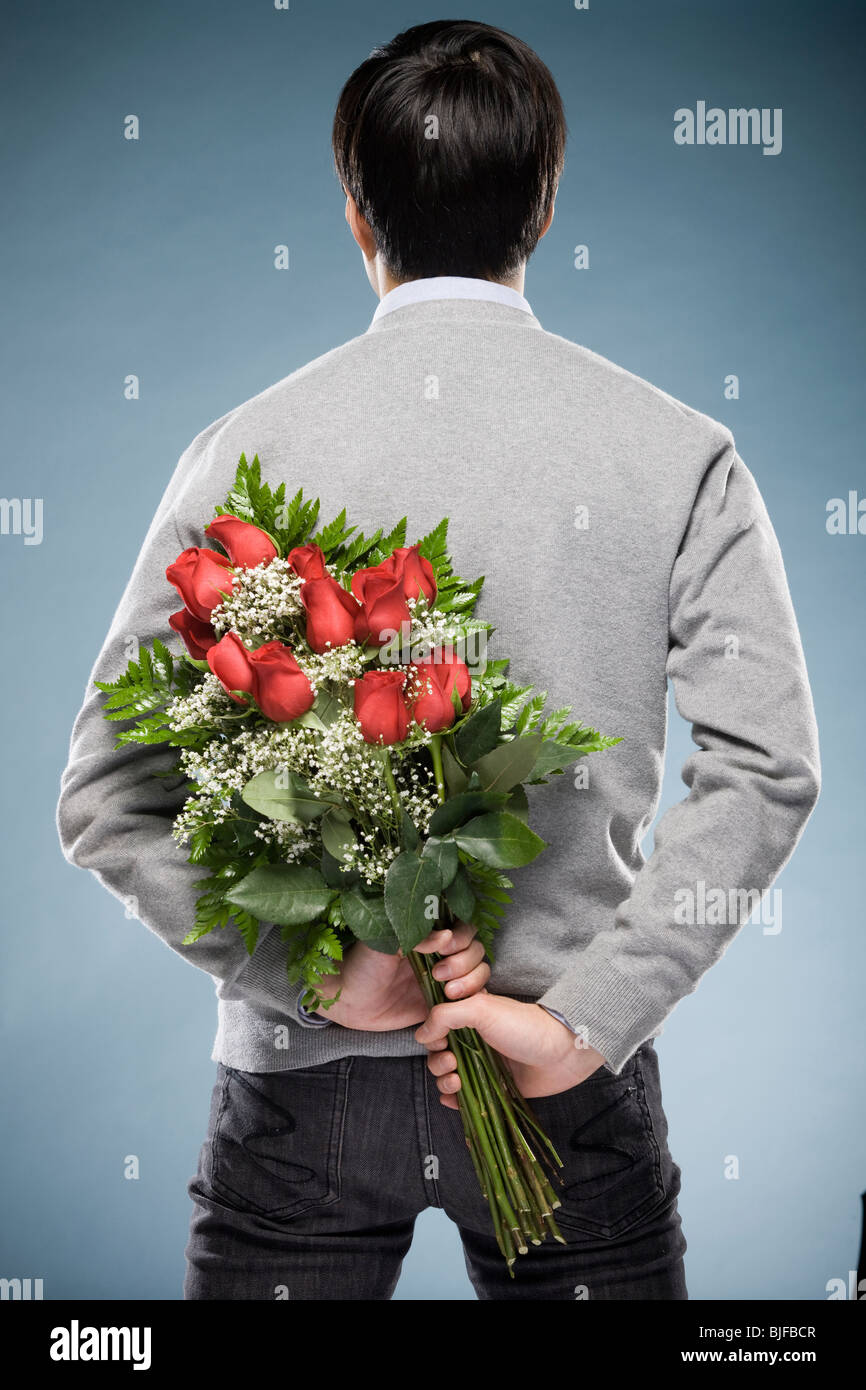 Behind the back hi-res stock photography and images - Alamy