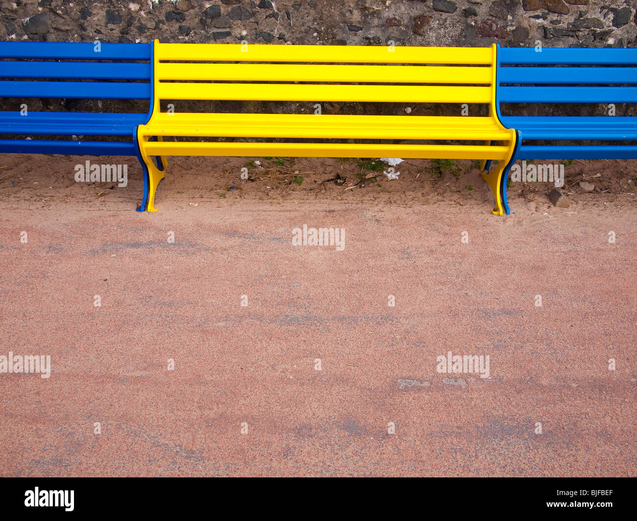 Blue and Yellow Park Benches Stock Photo - Alamy