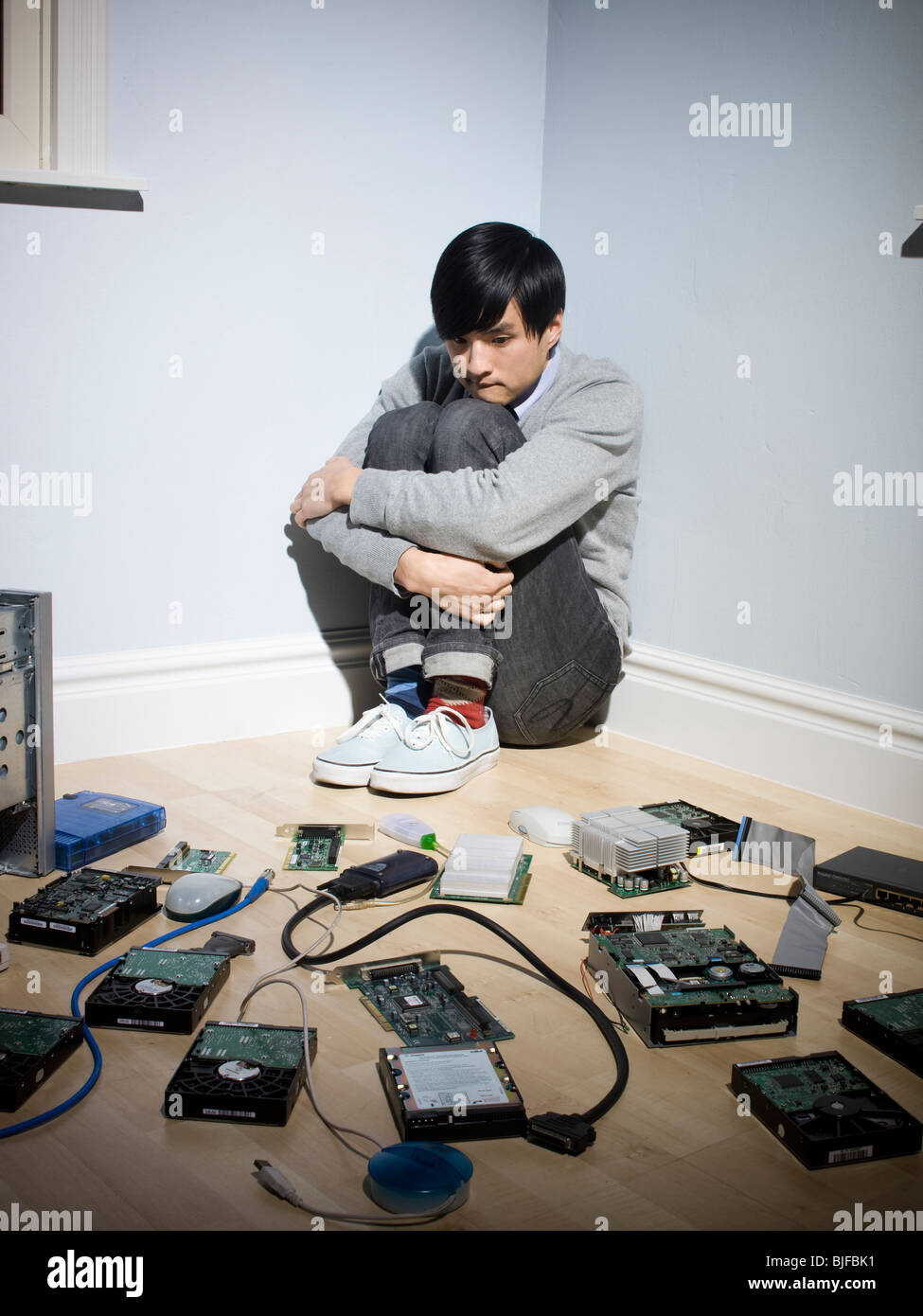Man in surrounded computer parts hi-res stock photography and images ...