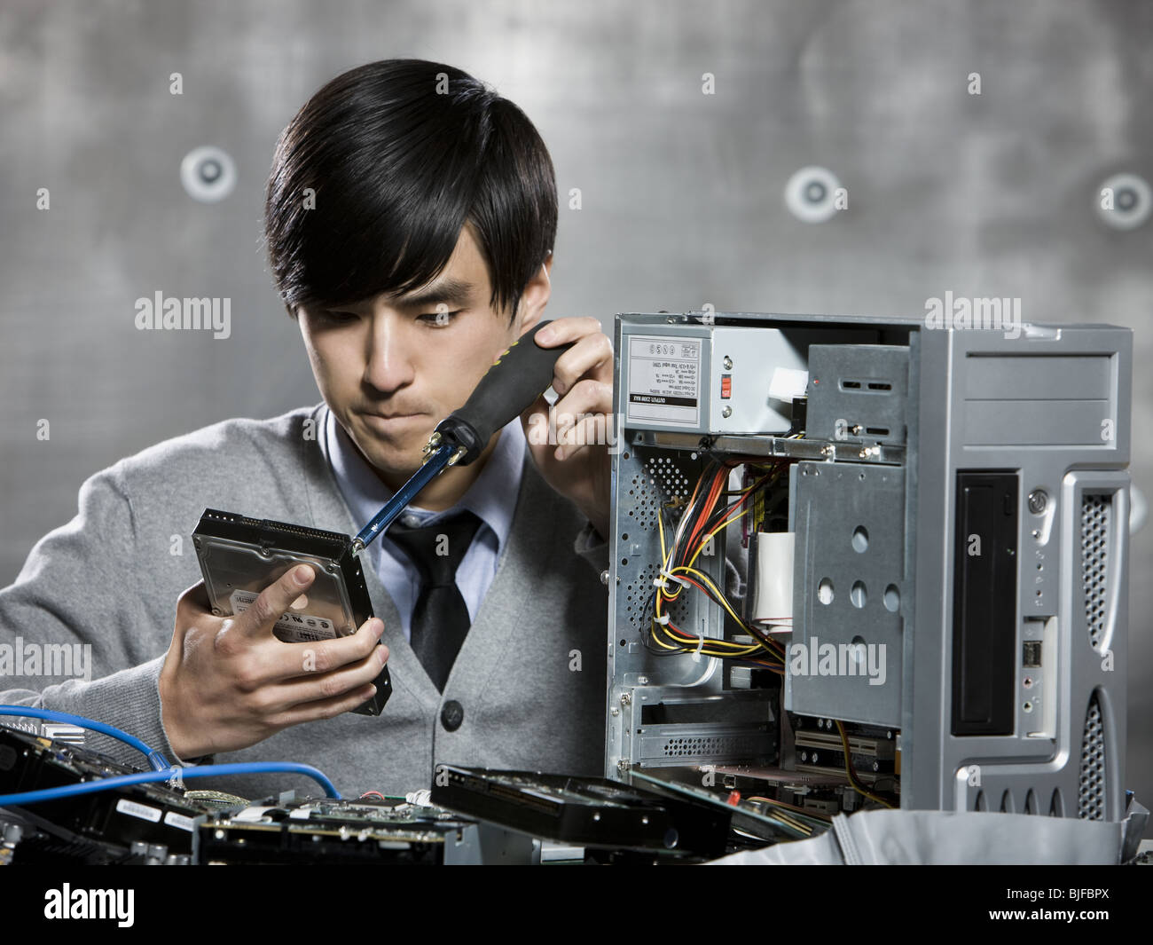 man working on a computer Stock Photo - Alamy