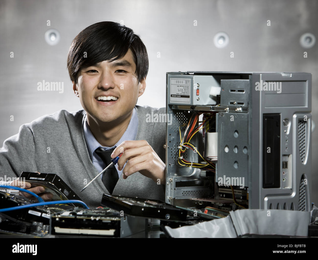 man working on a computer Stock Photo - Alamy